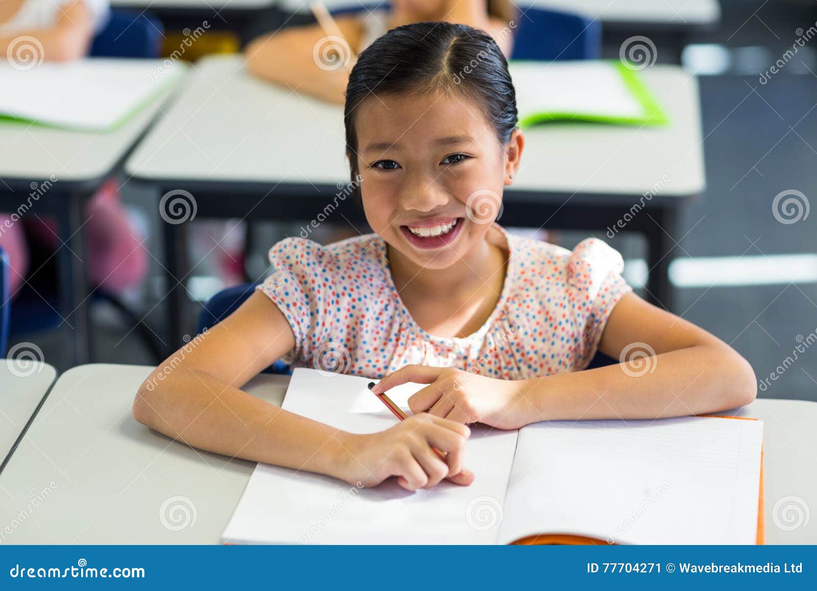 Smiling Girl Writing on Book Stock Image - Image of camera, knowledge ...
