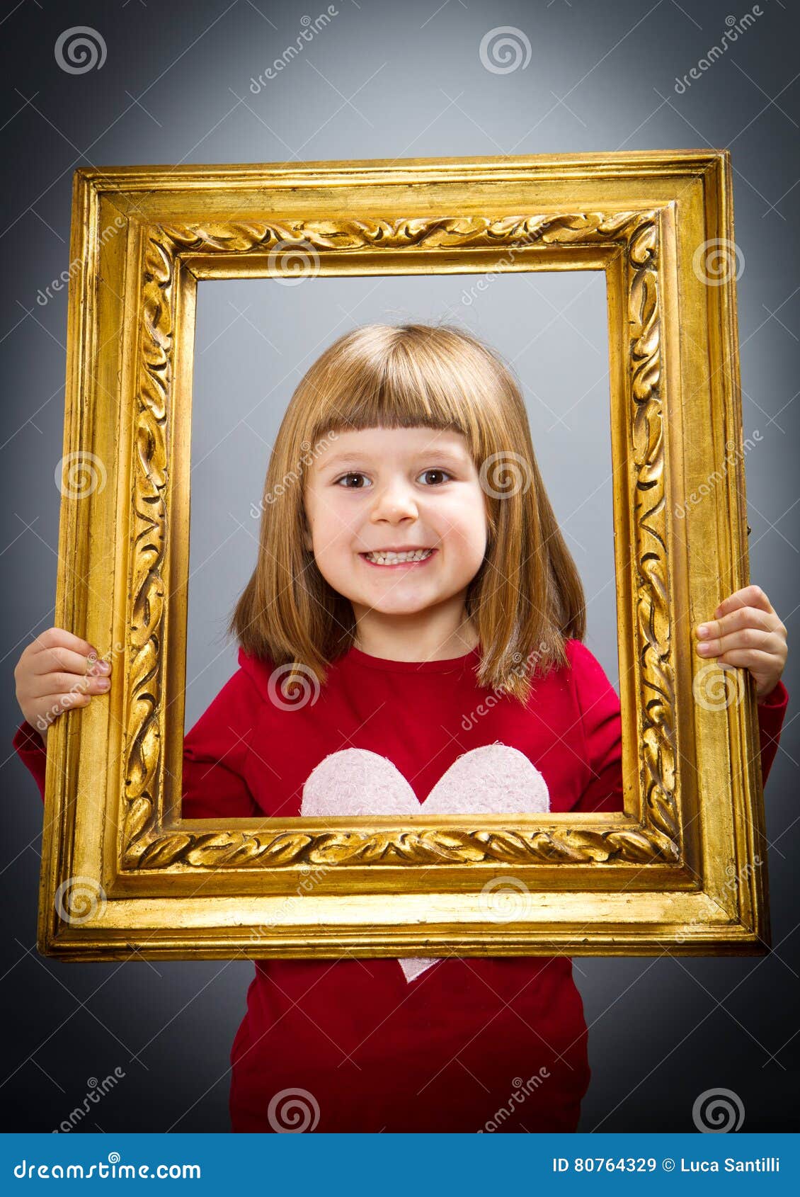 Smiling Girls Looking through a Vintage Picture Frame Stock Image ...