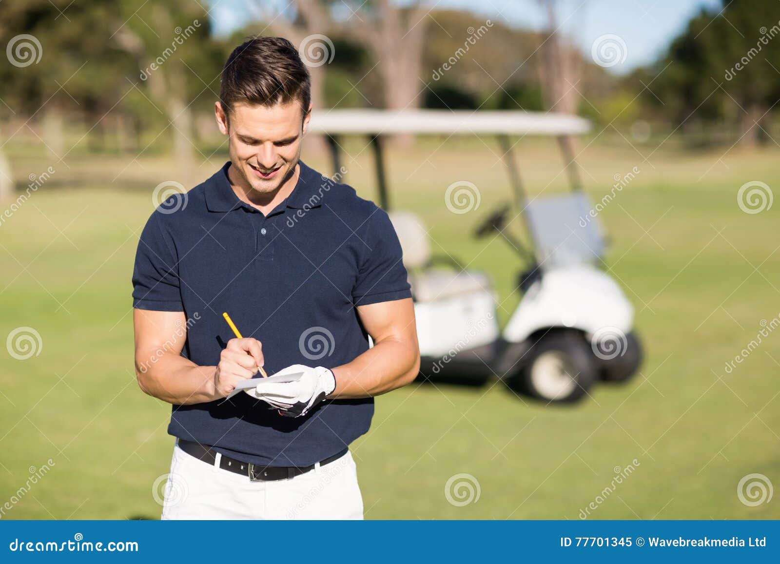 Smiling Golfer Writing on Score Card Stock Image - Image of adult ...