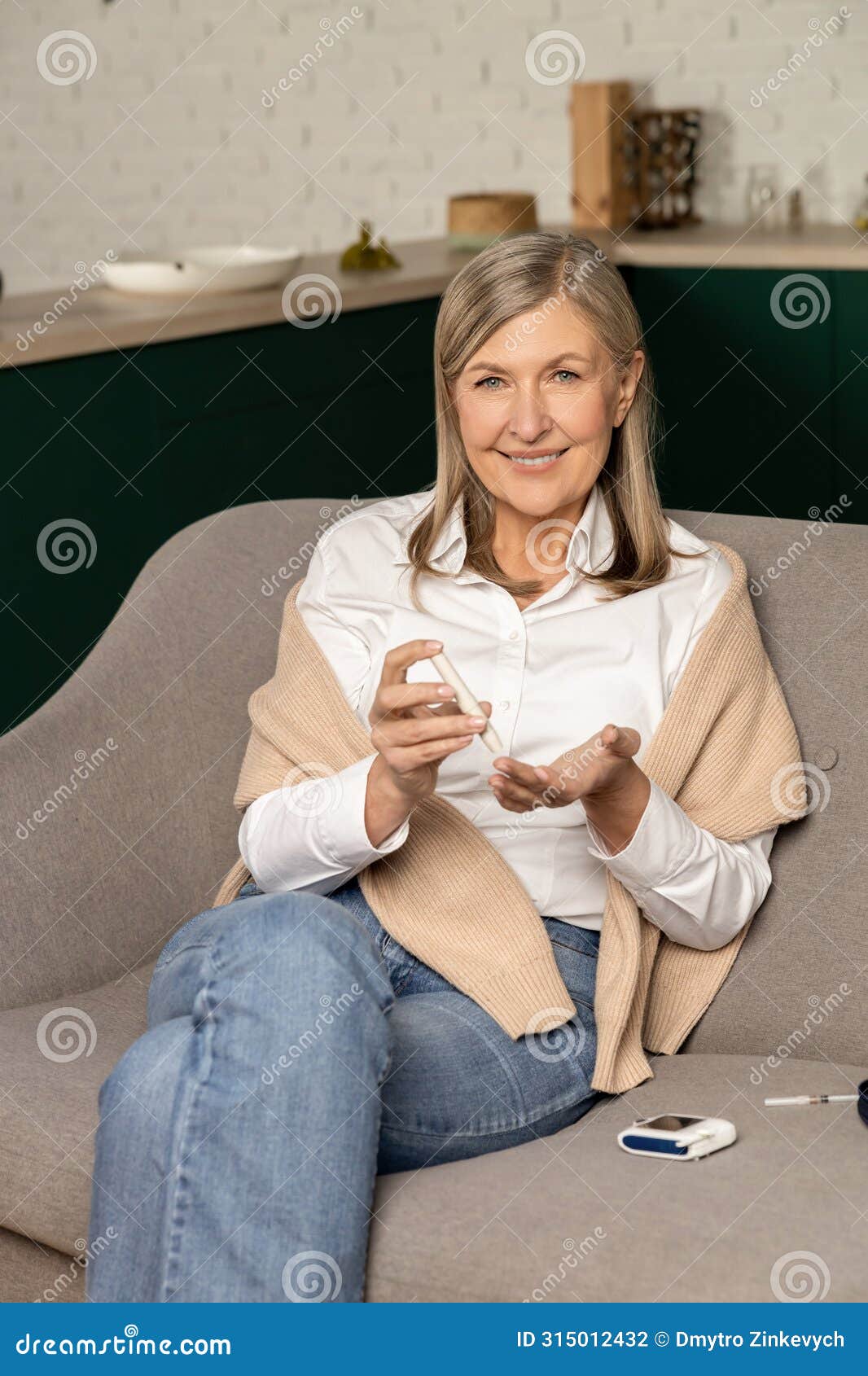 Smiling Good-looking Woman with Blood Sugar Testing Stick Stock Photo ...