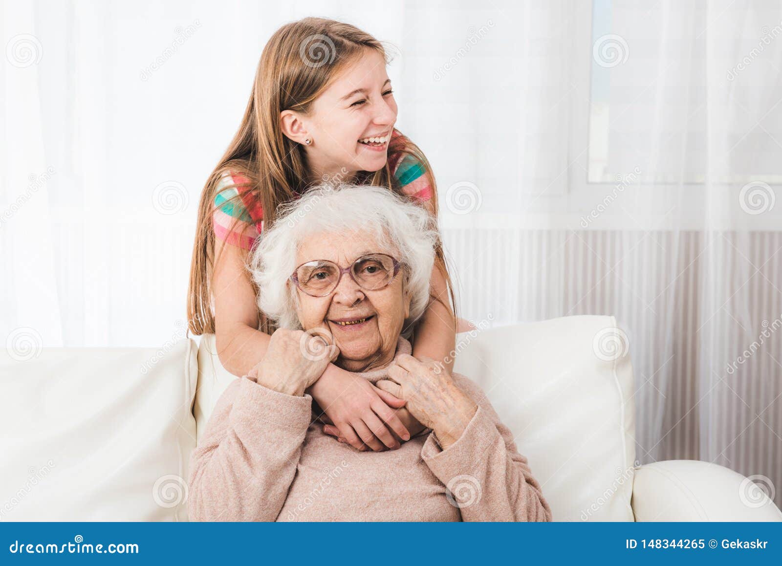Granddaughter Hugging Grandmother Stock Image Image Of Mature