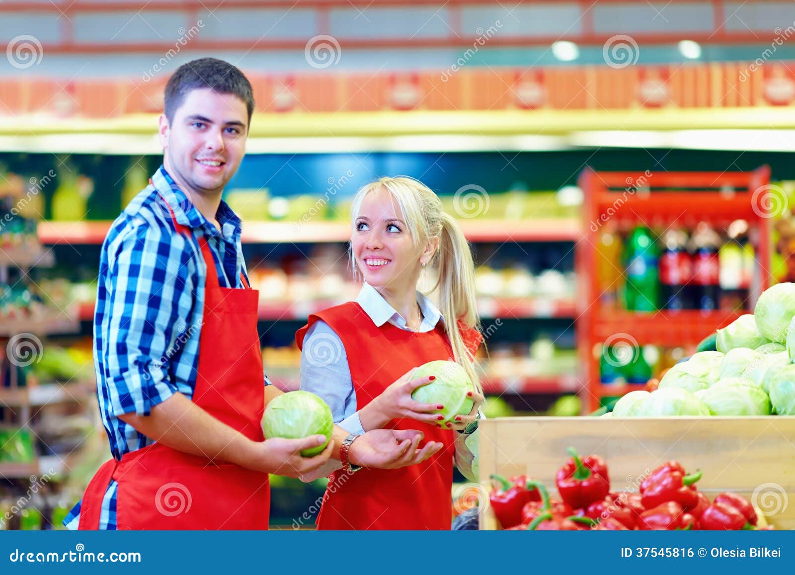 Smiling Grocery Staff Working in Supermarket Stock Photo - Image of ...