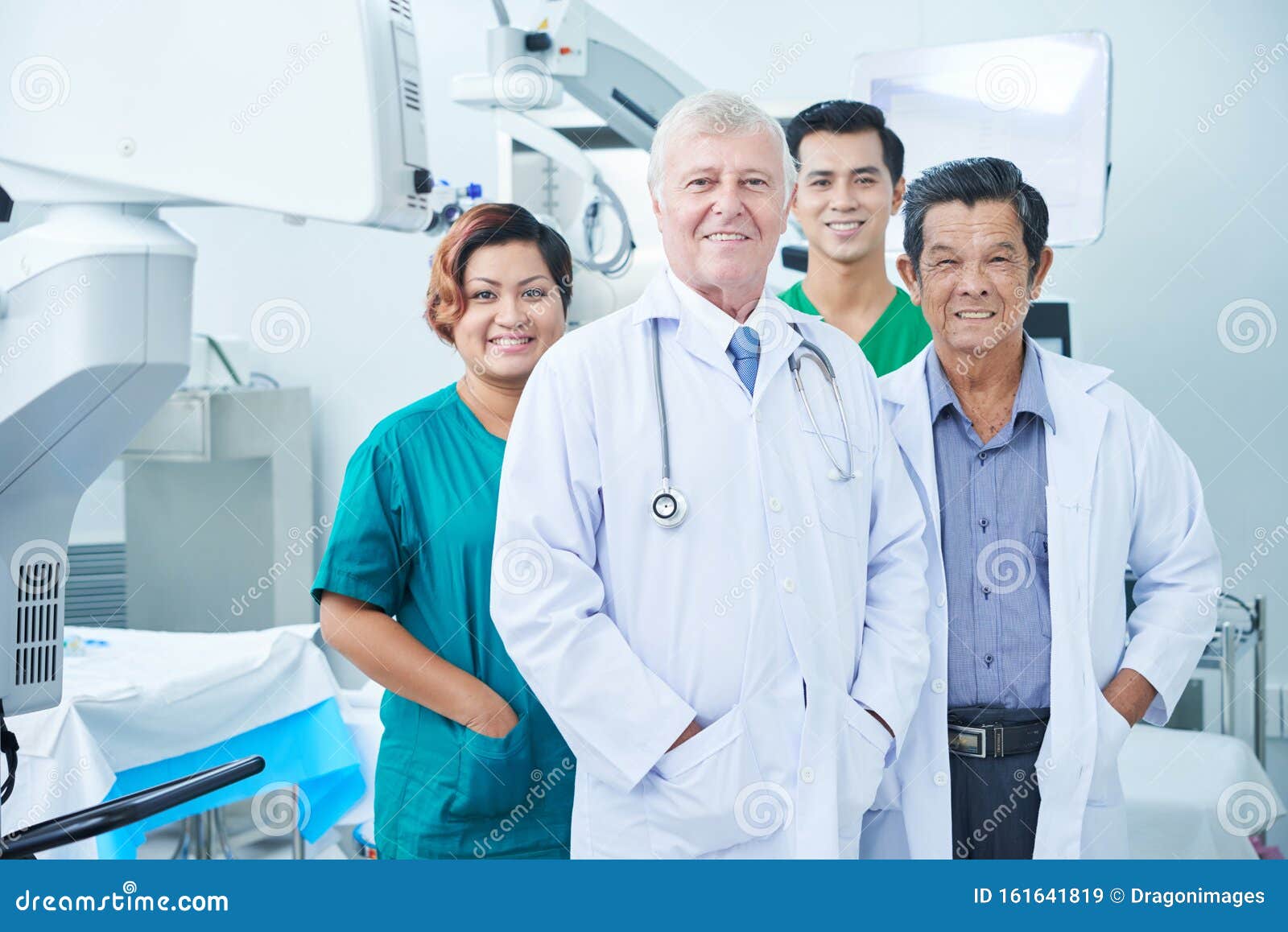 Smiling Group of Doctors and Surgeons Stock Image - Image of indoors ...