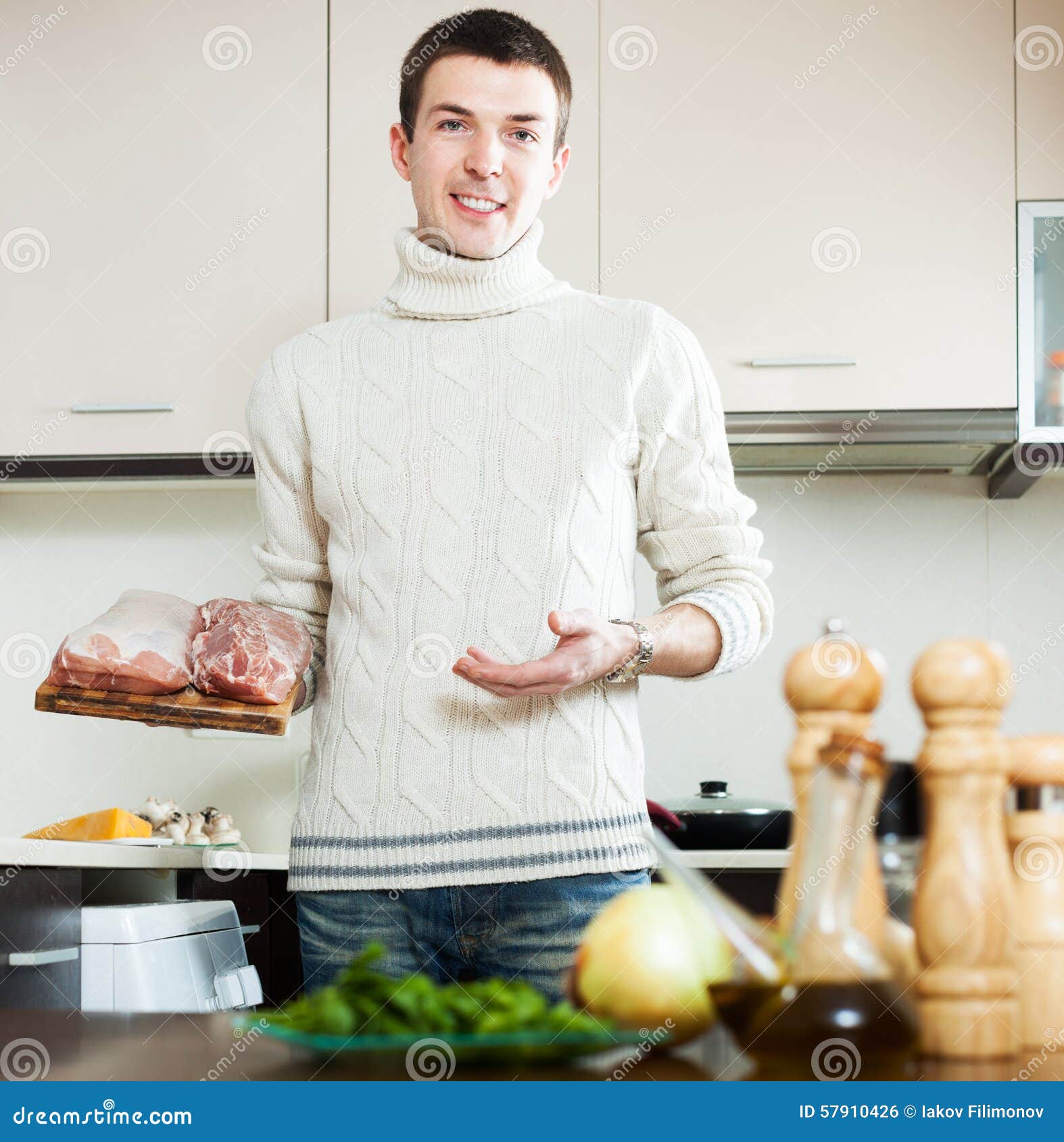 Smiling Guy Cooking at Home Stock Photo - Image of house, handsome ...