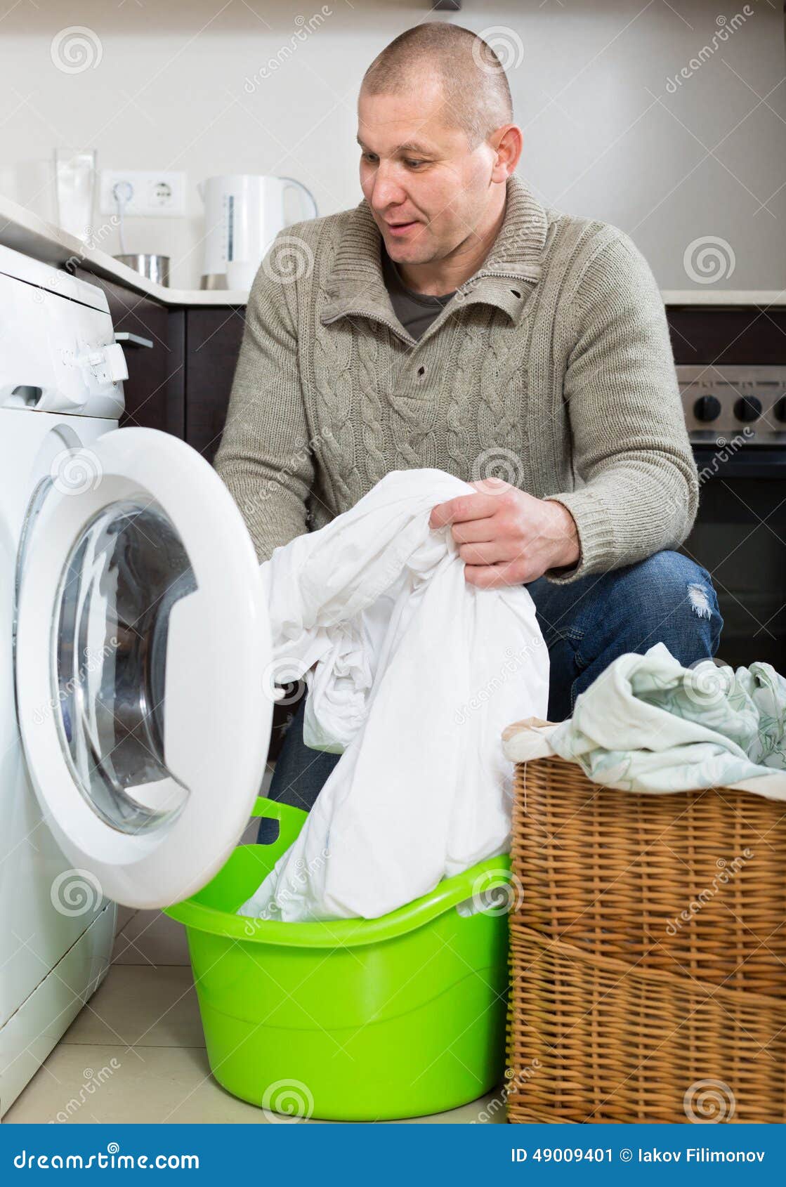 Smiling Guy Using Washing Machine Stock Image - Image of holding ...