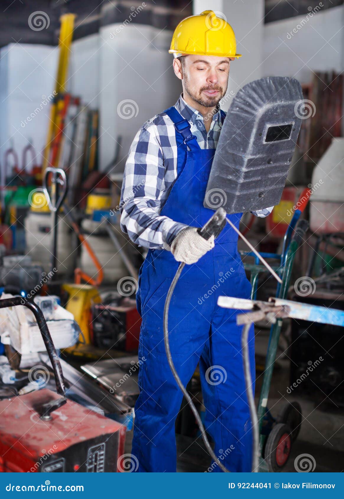 Smiling Guy Using Welder for Construction Work Stock Image - Image of ...