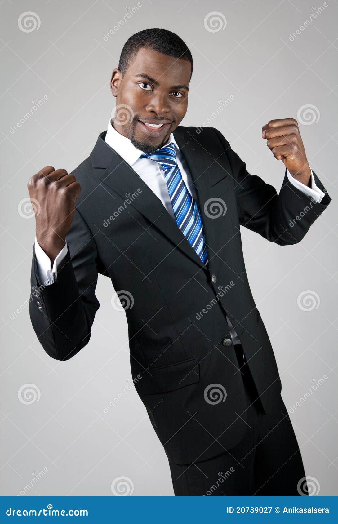 Smiling Handsome Businessman Showing His Strength Stock Image - Image ...