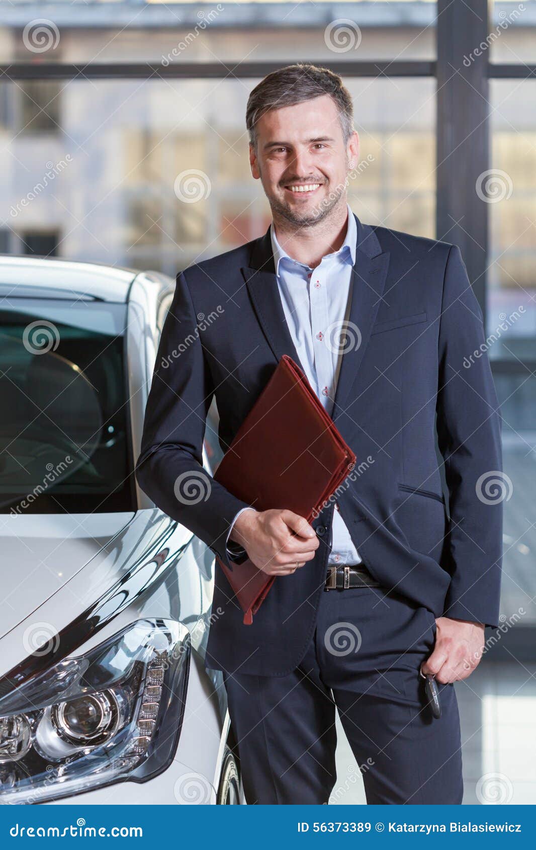 Smiling handsome car agent stock image. Image of salesman - 56373389