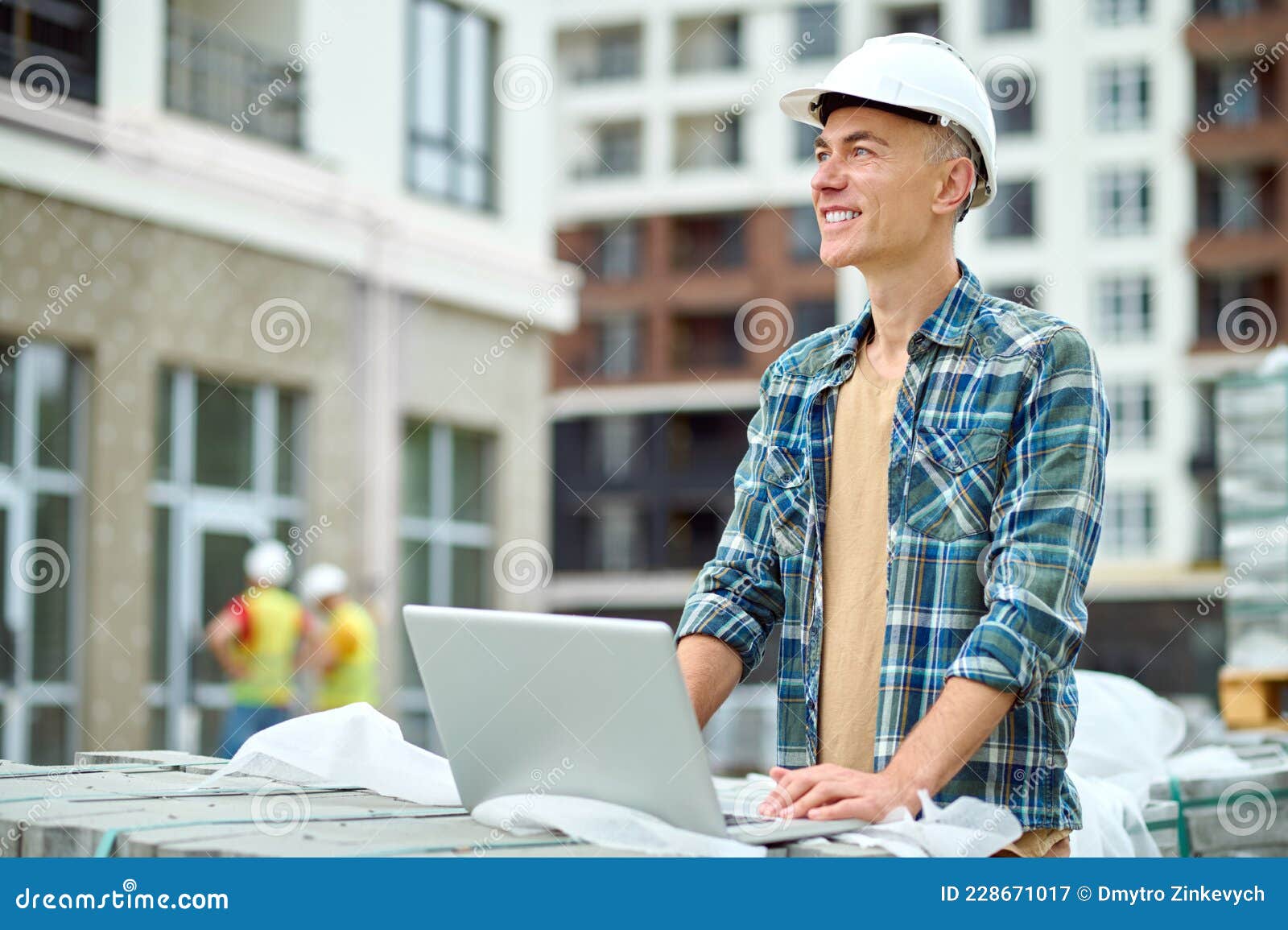 Happy Attractive Engineer in a Hardhat Looking into the Distance Stock ...