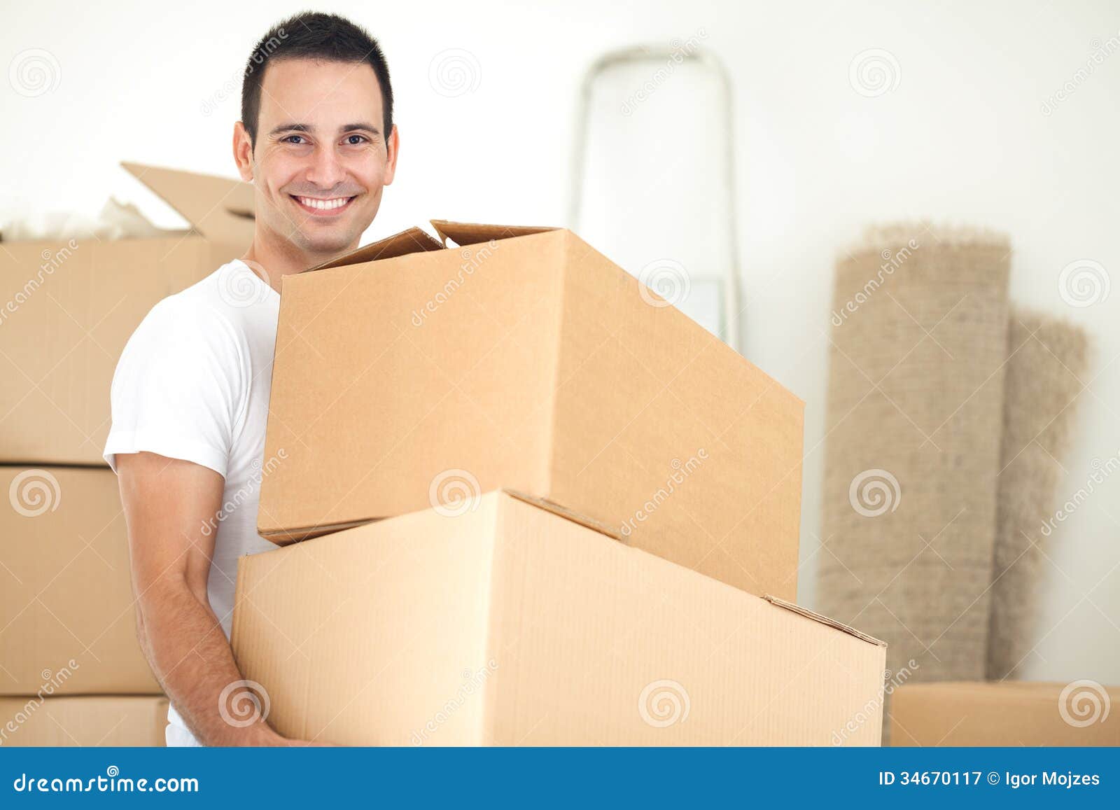 Smiling Handsome Man Carrying Packages Stock Image - Image of moving ...