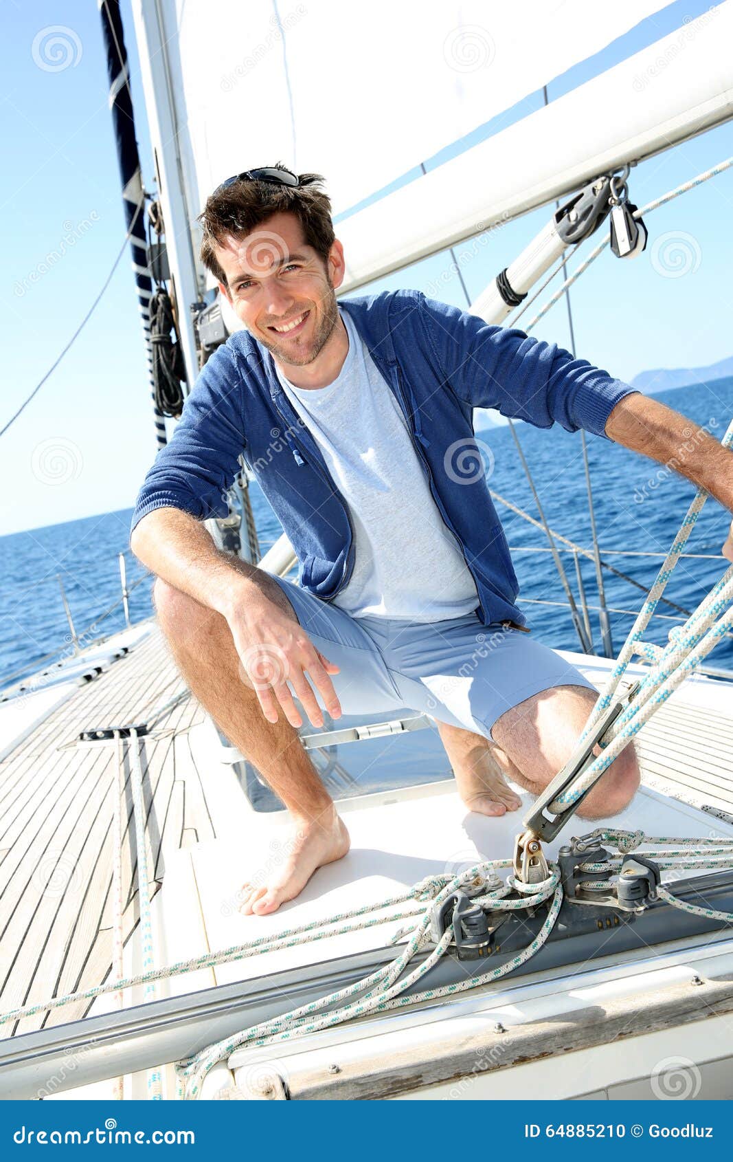 Smiling Handsome Man Enjoying Sailing Stock Photo - Image of navigation ...