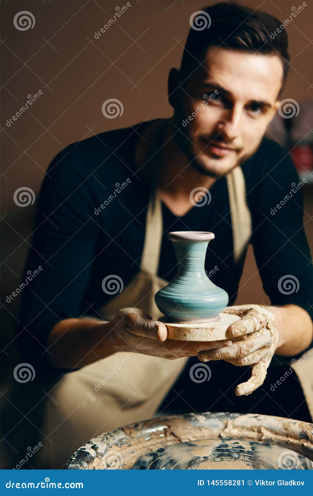 Smiling Handsome Man Showing Handmade Ceramic Pot at Pottery Workshop ...