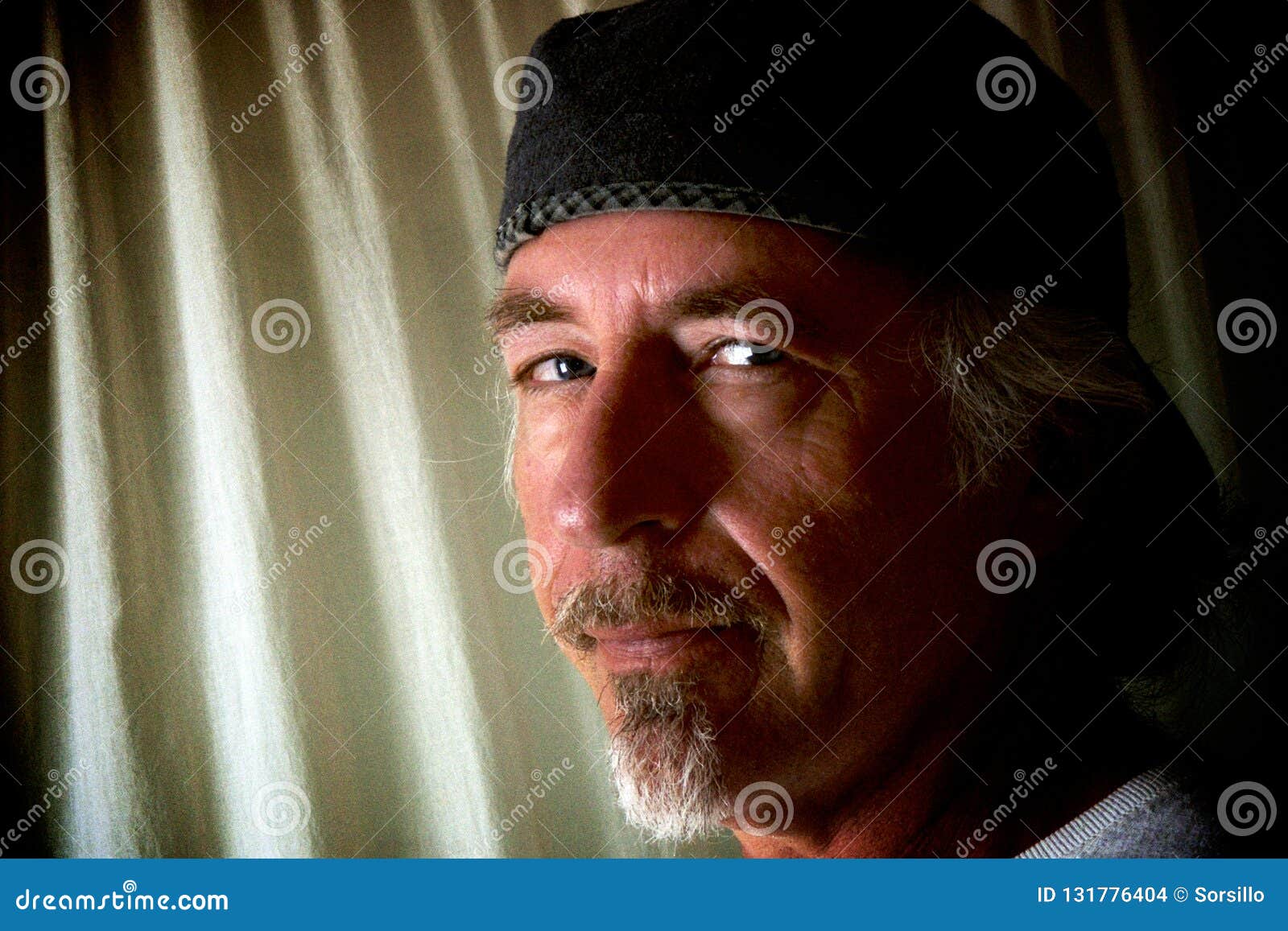 Smiling Handsome Man Wearing a Hat with Goatee, Looking at Viewer Stock ...