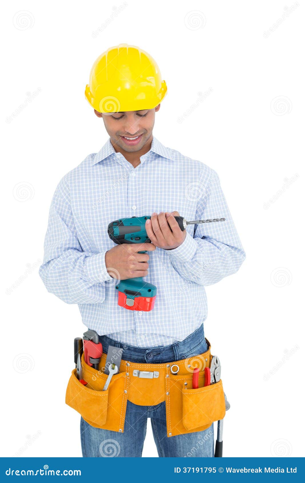 Smiling Handsome Young Handyman Looking at Drill Stock Image - Image of ...
