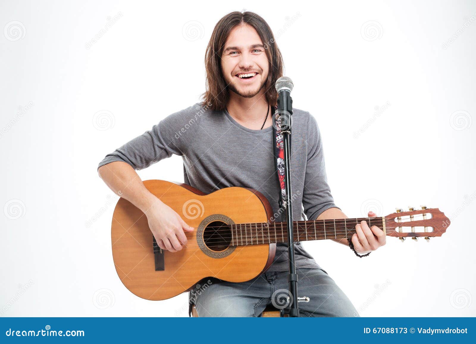 Smiling Handsome Young Man with Guitar Singing in Microphone Stock ...