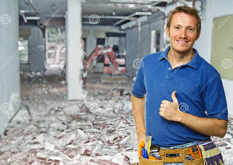 Smiling handyman at work stock image. Image of handyman - 17007389