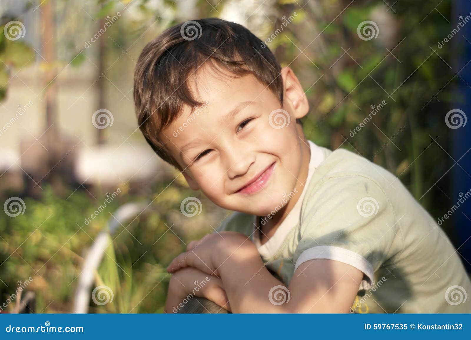 Smiling happy boy outdoors stock image. Image of cute - 59767535