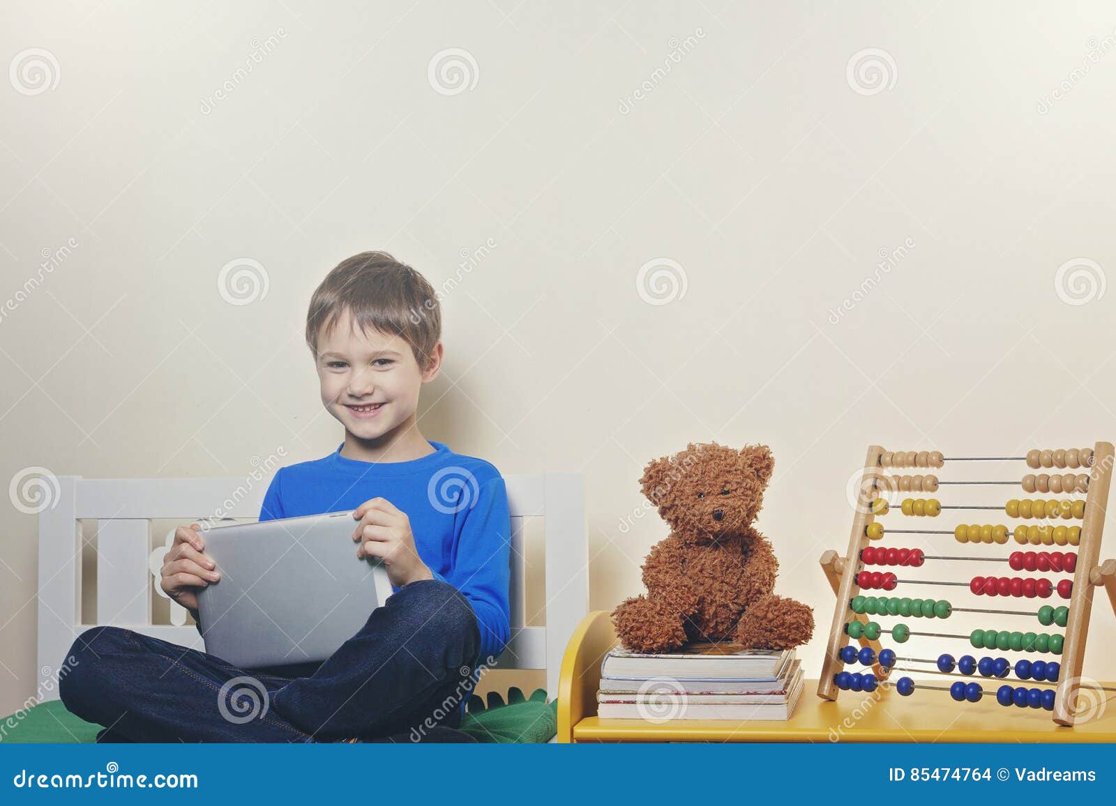 Smiling Happy Child with Digital Tablet Computer at Home Stock Photo ...