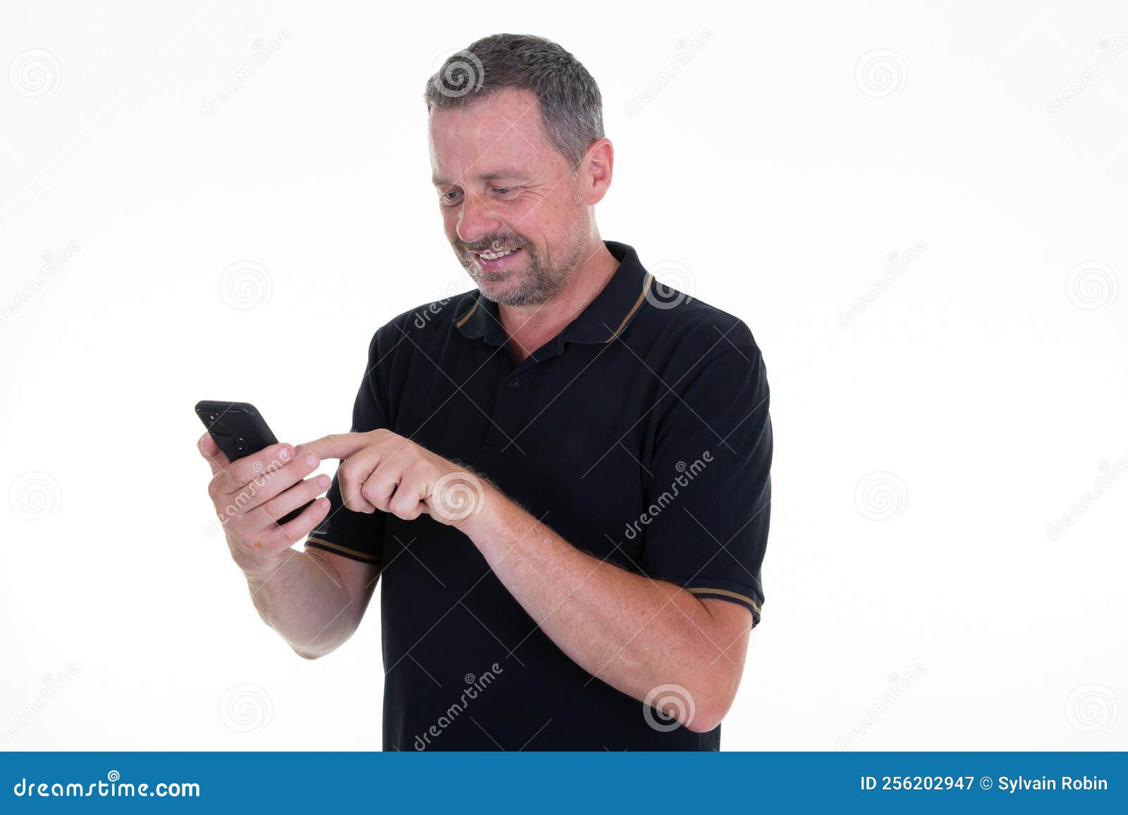 Smiling Happy Friendly Man Holding Texting on Mobile Phone Stock Image ...