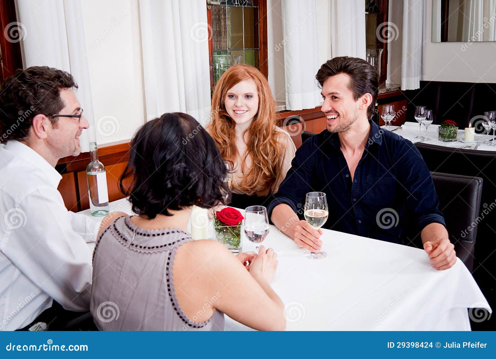 Smiling Happy People in Restaurant Stock Photo - Image of attractive ...