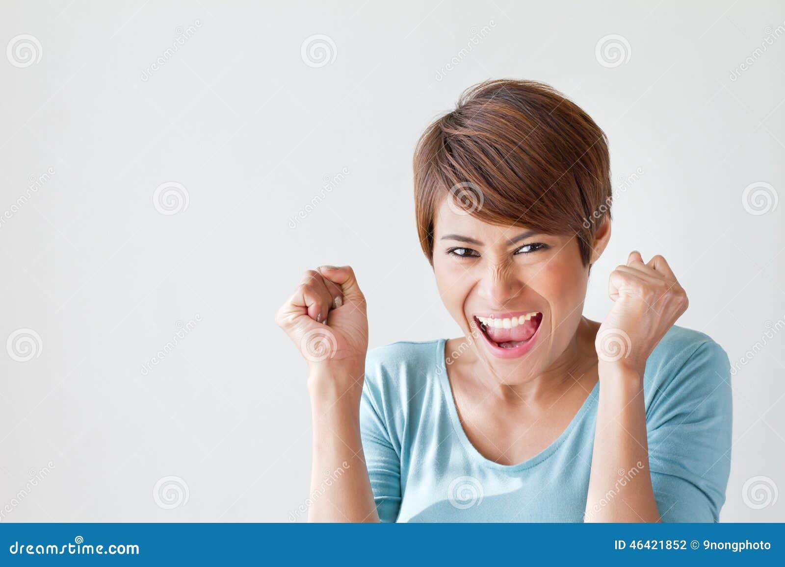 Smiling, Happy, Positive, Excited Woman on Plain Background Stock Photo ...