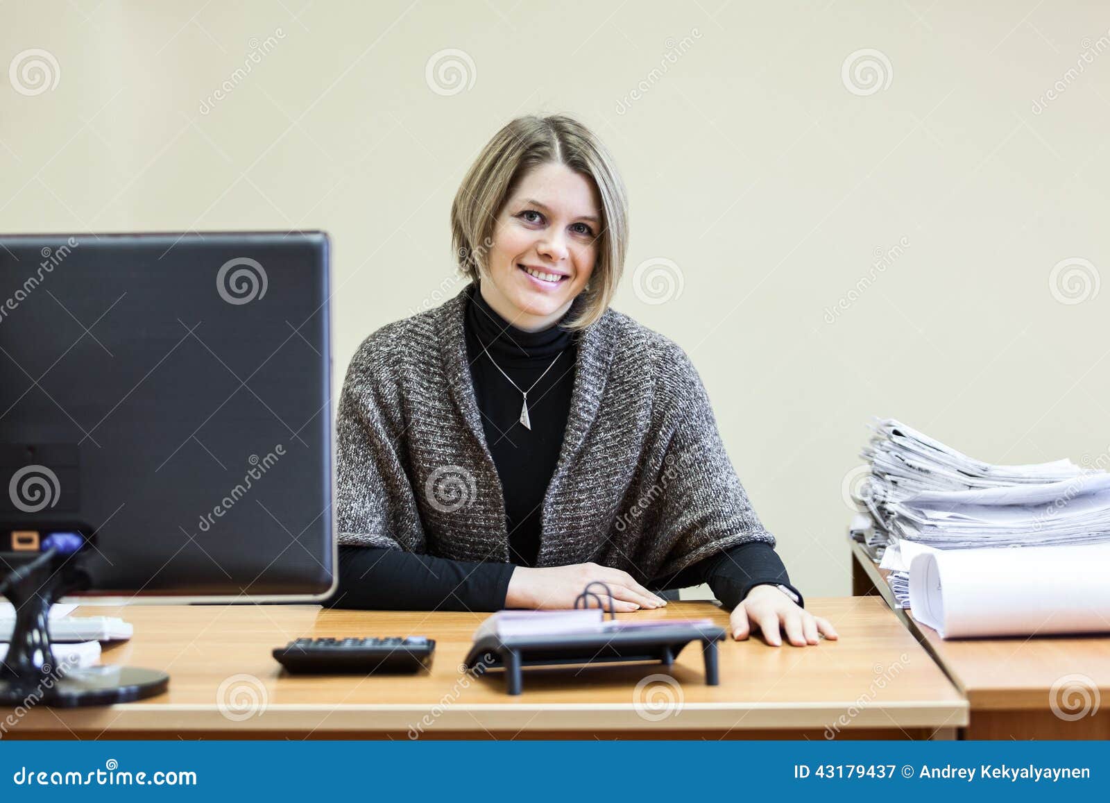 Smiling Happy Secretary at Table Looking at Camera Stock Image - Image ...