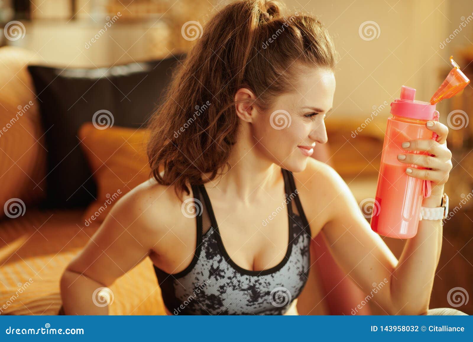 Smiling Sports Woman with Shaker with Fitness Supplements Stock Photo ... Smiling Sports Woman with Shaker with Fitness Supplements Stock Photo ...