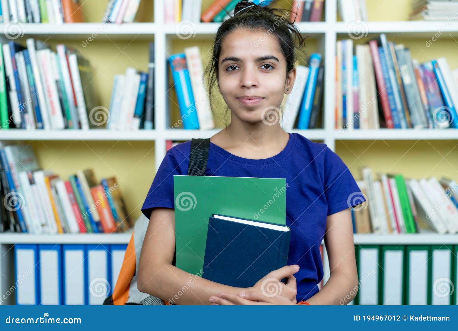 Smiling Indian Female Student with Books and Paperwork Stock Photo ...