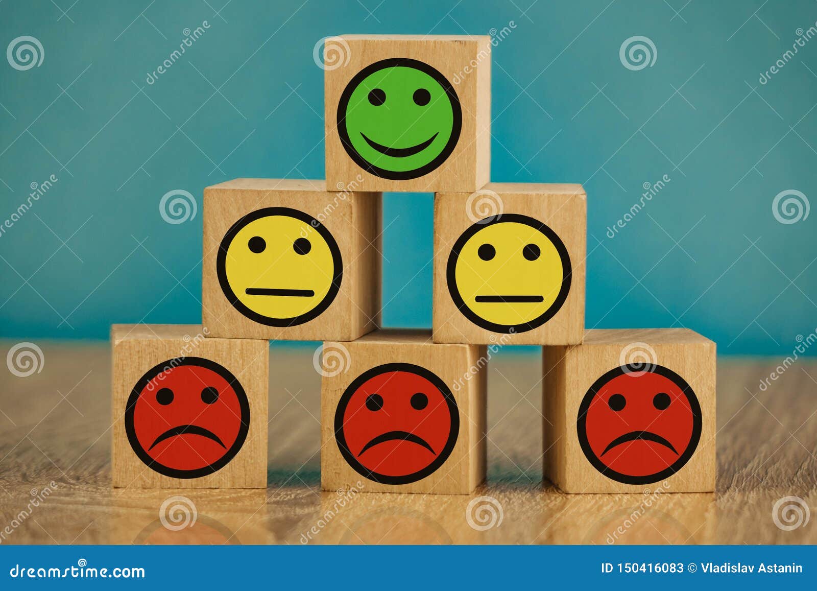 Smiling, Indifferent and Sad Emoticons on a Blue Background ...