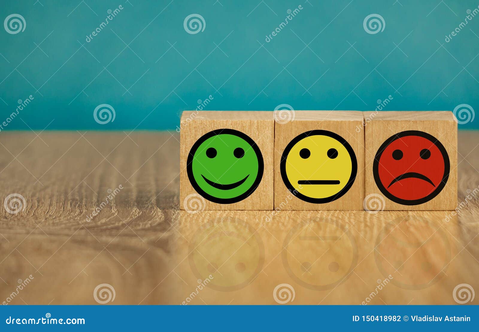 Smiling, Indifferent and Sad Emoticons on a Blue Background ...