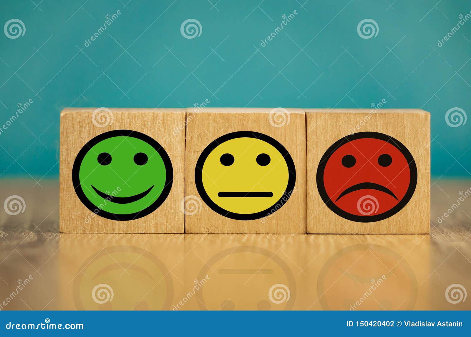Smiling, Indifferent and Sad Emoticons on a Blue Background ...