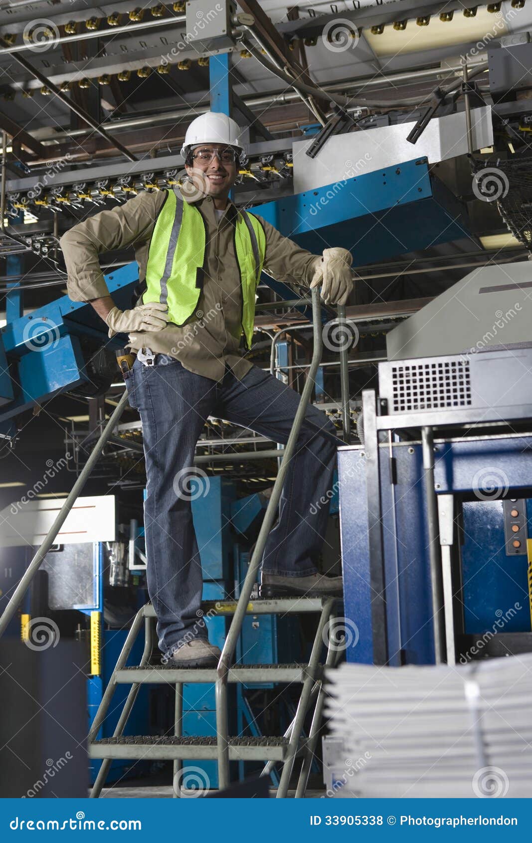 Smiling Industrial Machine Operator Stock Photo - Image of latin ...