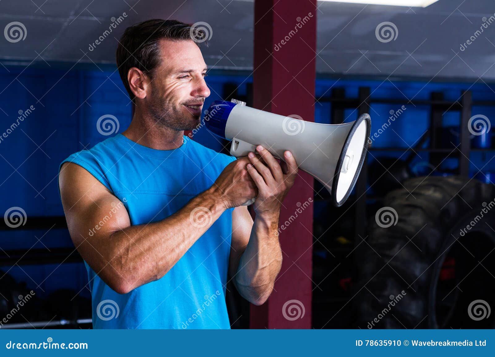 Smiling Instructor Holding Megaphone Stock Photo - Image of athlete ...