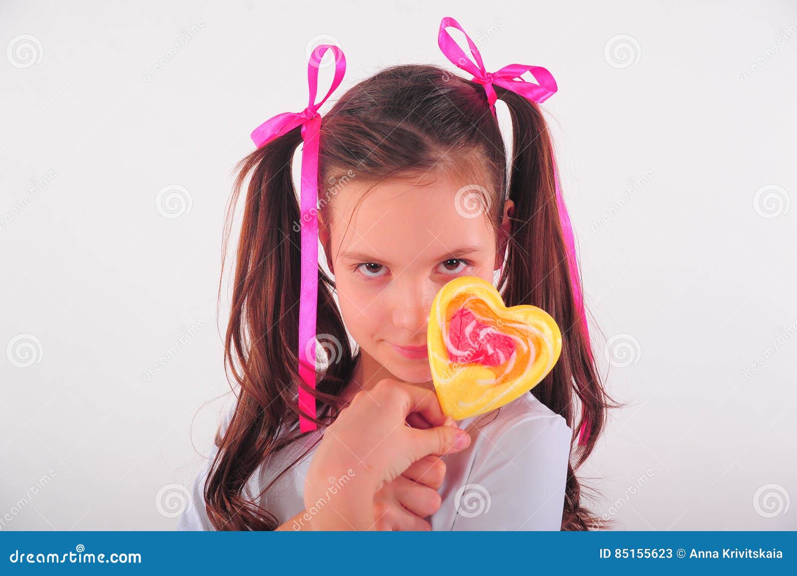 Smiling kid with candy stock image. Image of preschooler - 85155623