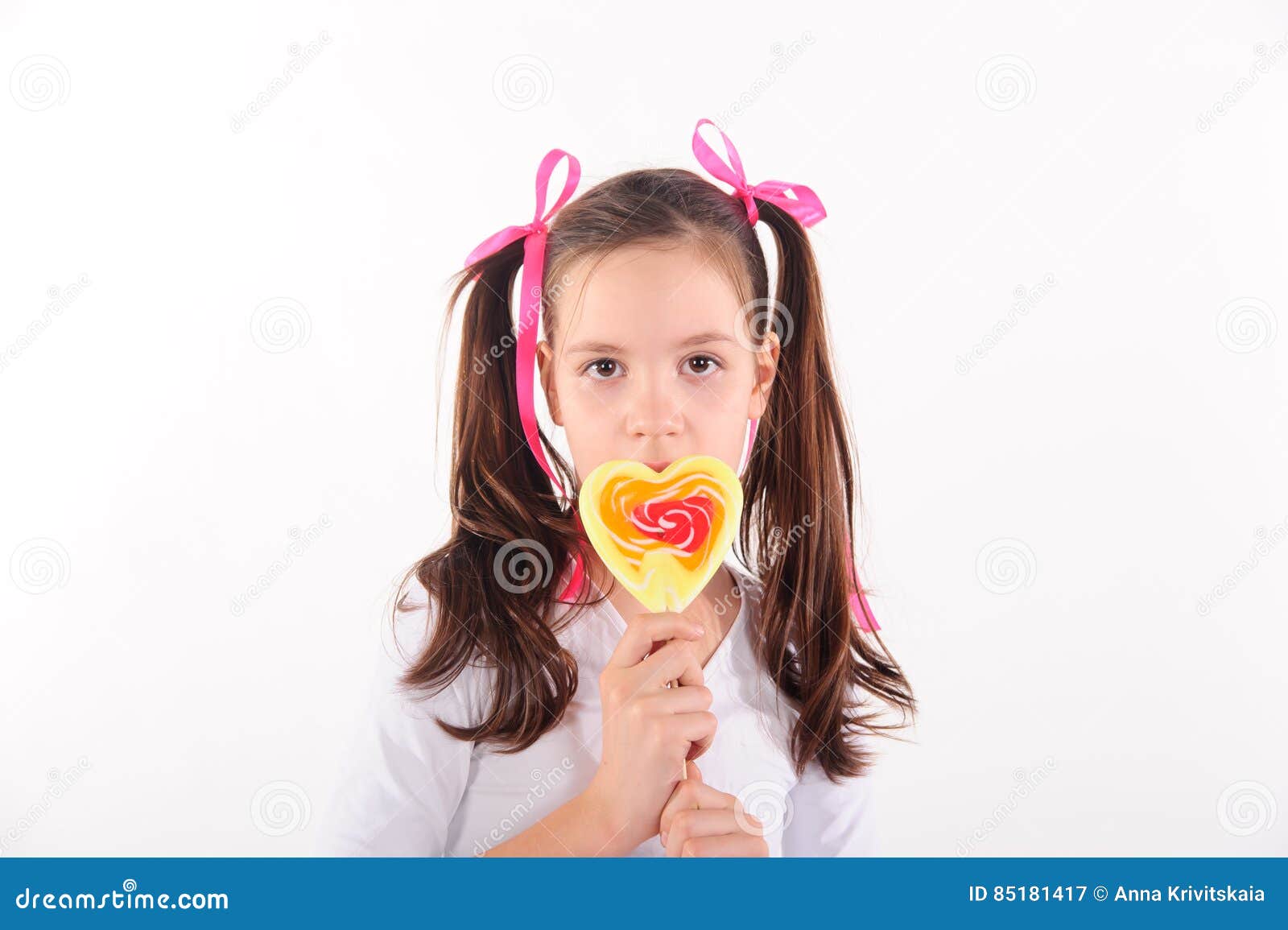 Smiling kid with candy stock image. Image of expression - 85181417