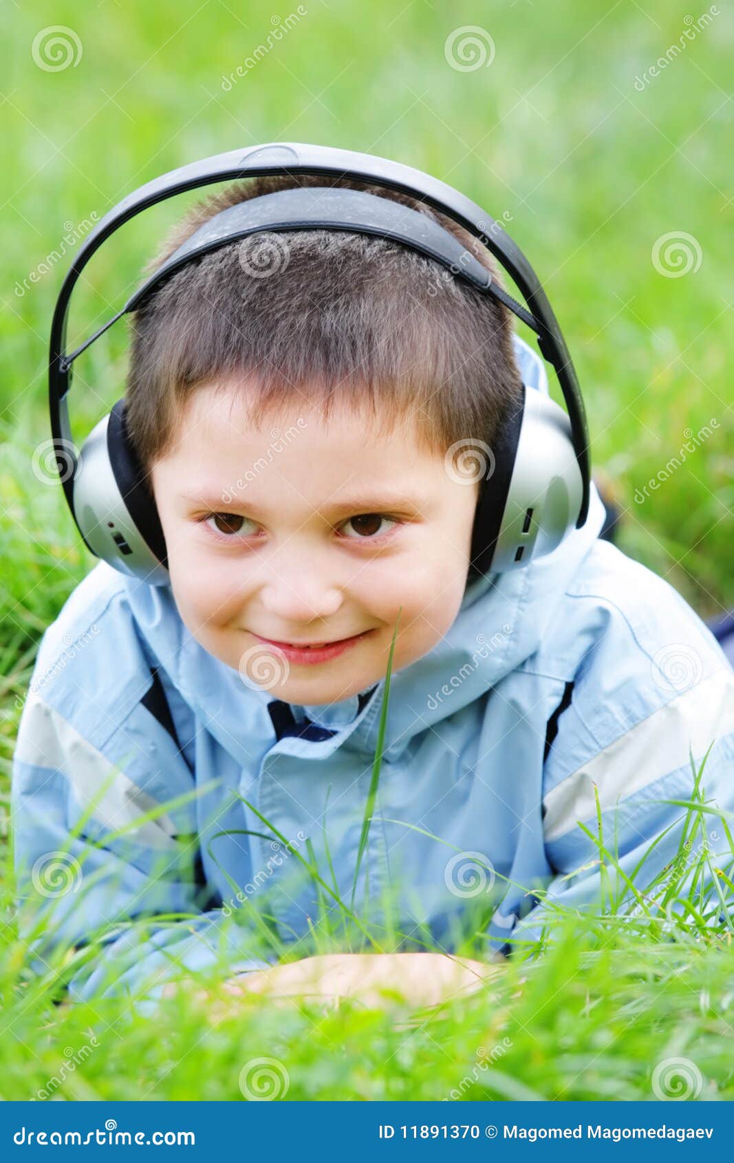 Smiling kid in headphones stock photo. Image of male - 11891370