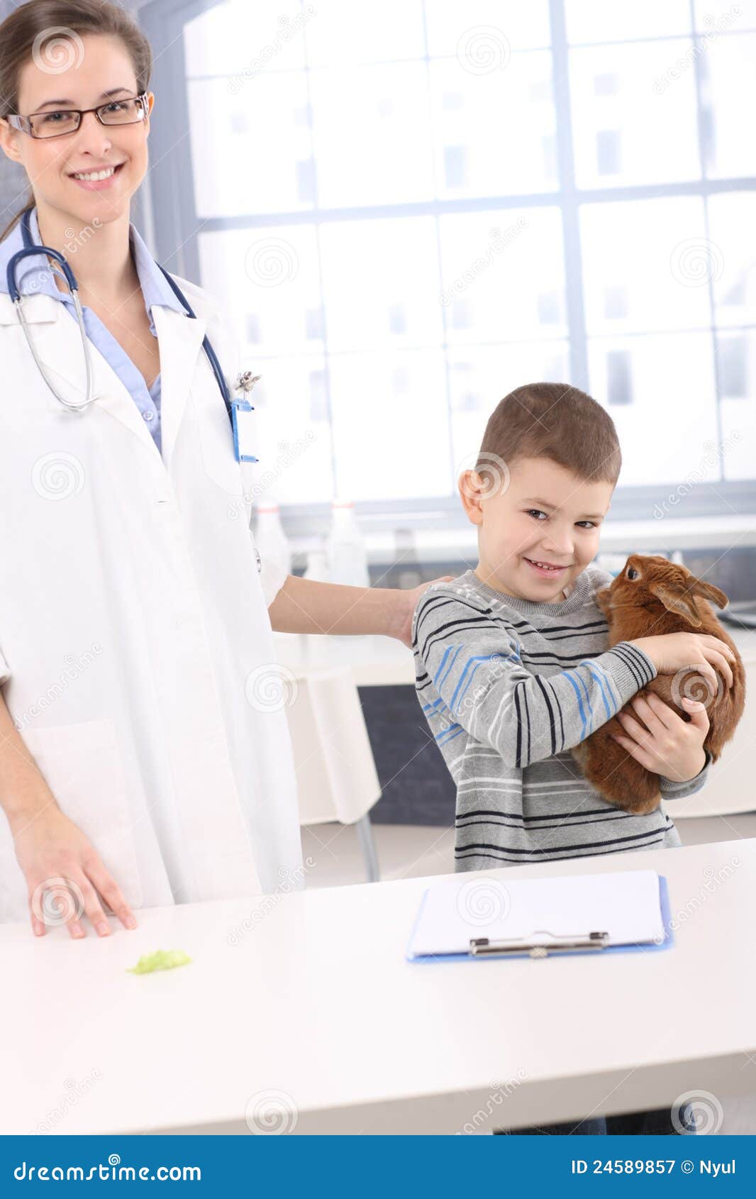 Smiling Kid with Pet Rabbit at Veterinary Stock Image - Image of clinic ...