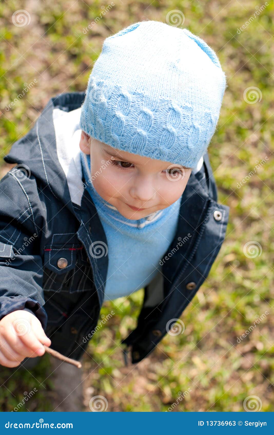 Smiling Kid is Playing with a Stick Stock Image - Image of clean, eyes ...