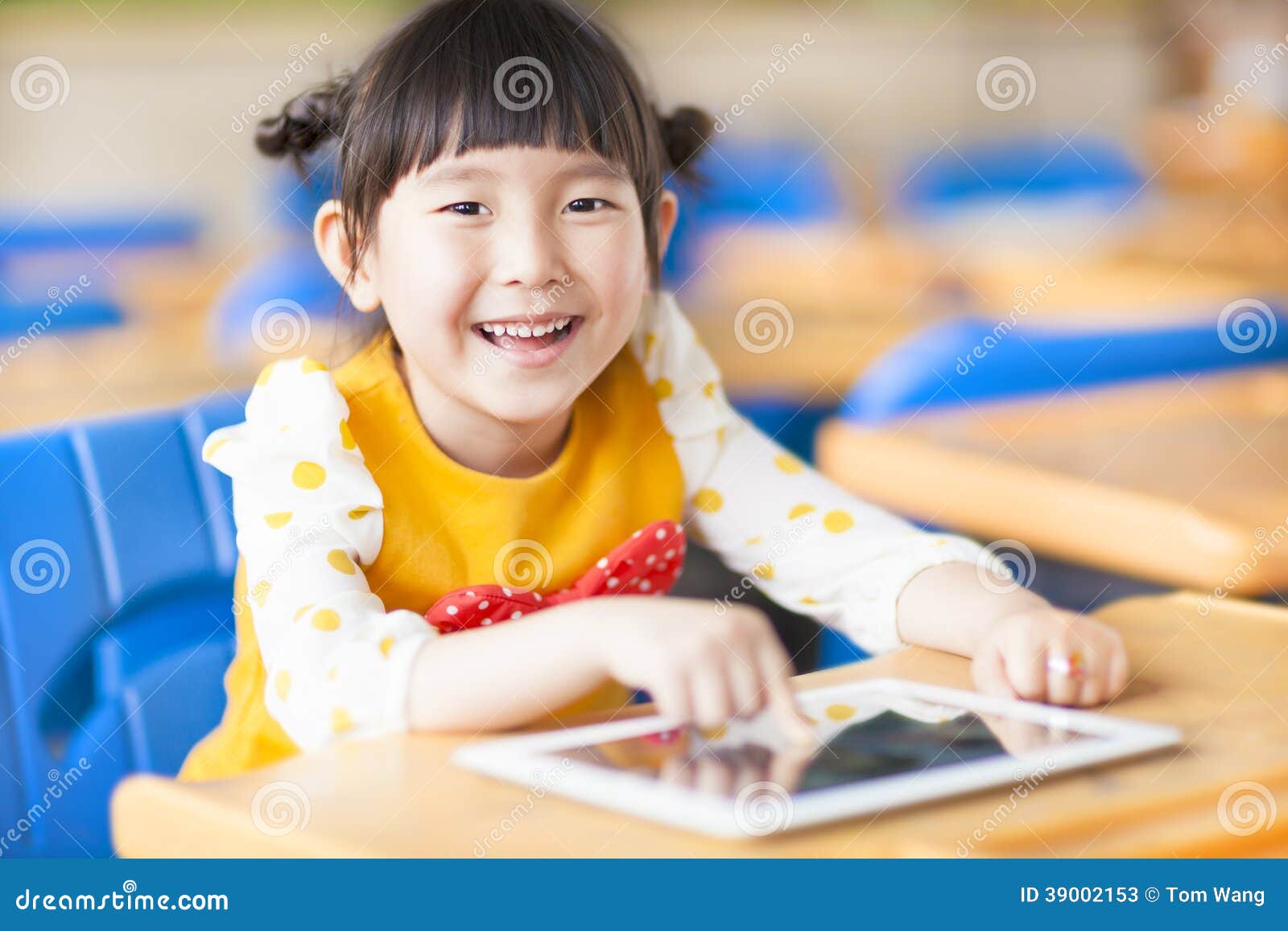 Smiling Kid Using Tablet or Ipad Stock Image - Image of networking ...