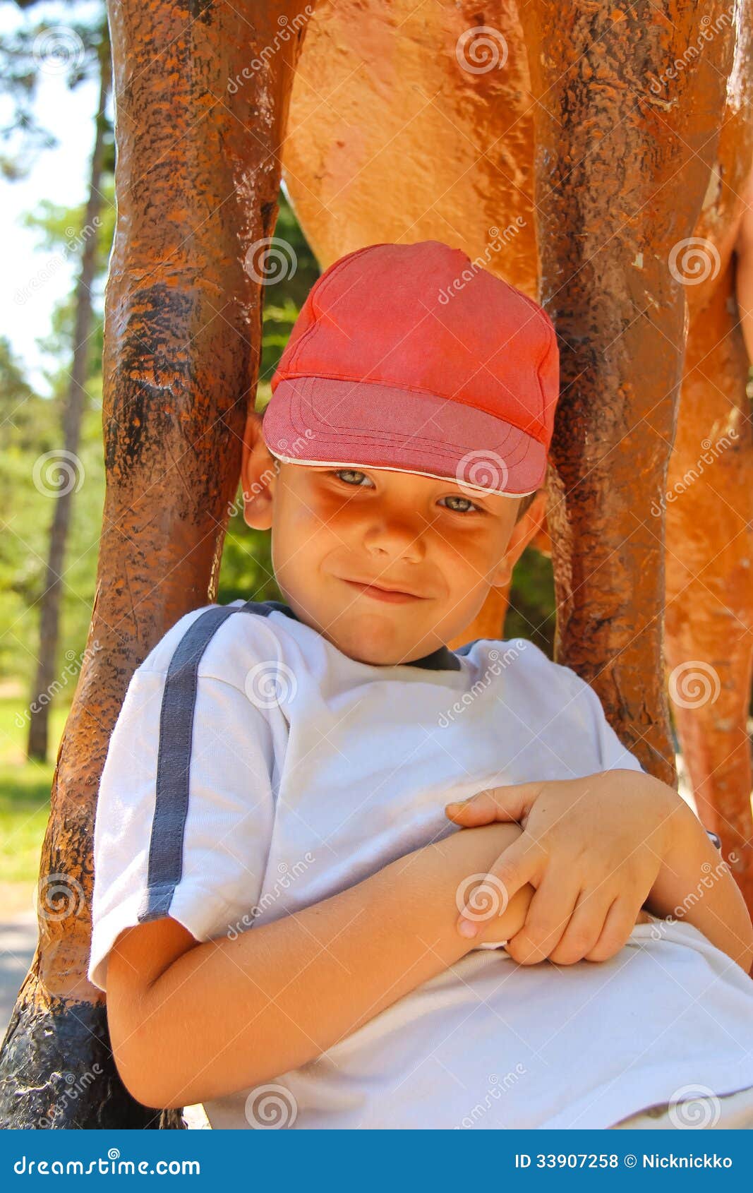 Smiling Kid Wearing a Cap in the Park Stock Photo - Image of joyful ...