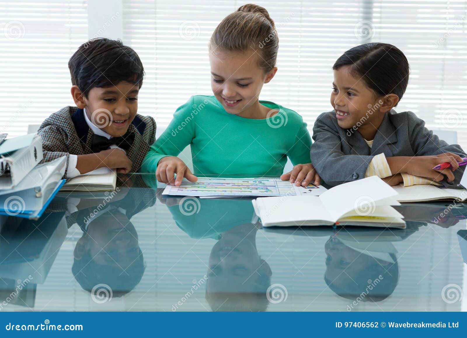 Smiling Kids Discussing in Boardroom Stock Photo - Image of childhood ...