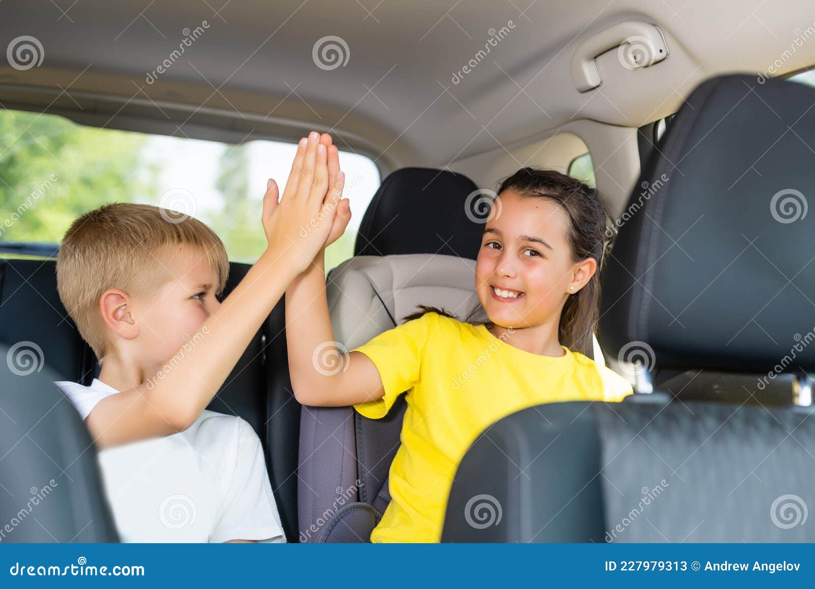 Smiling Kids Sitting on Back Seat of Car Stock Image - Image of food ...