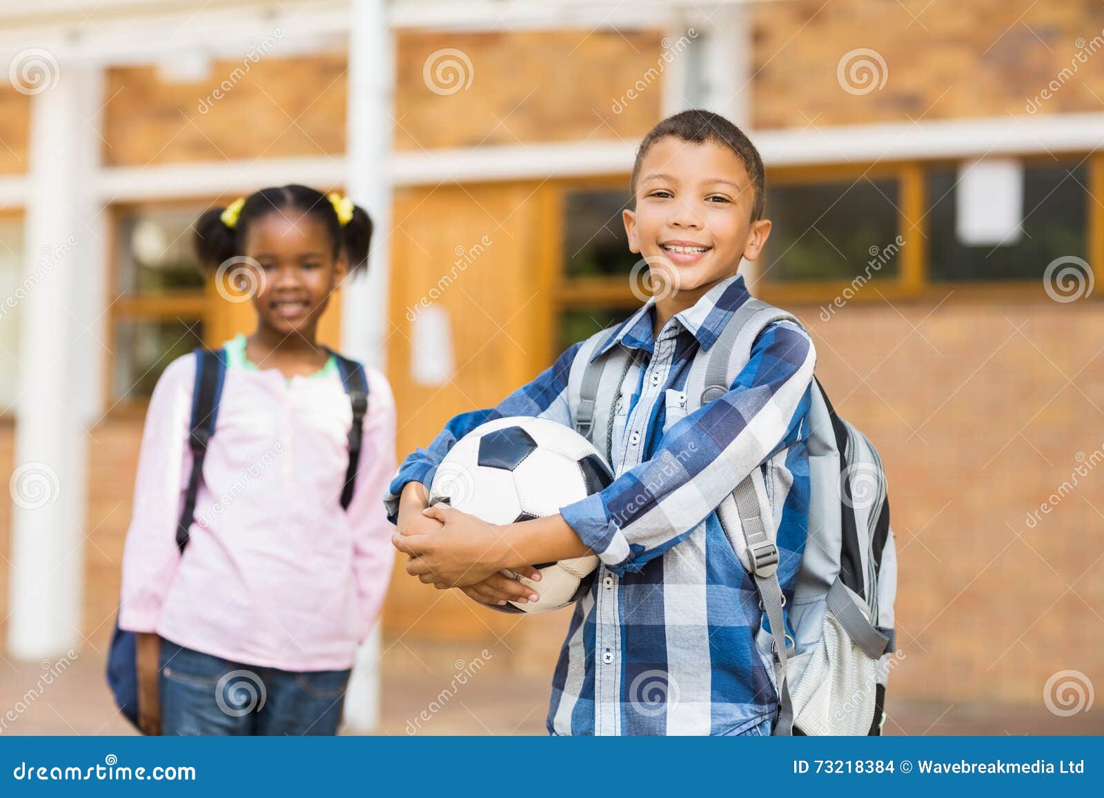 Smiling Kids Standing in Classroom at School Stock Photo - Image of ...