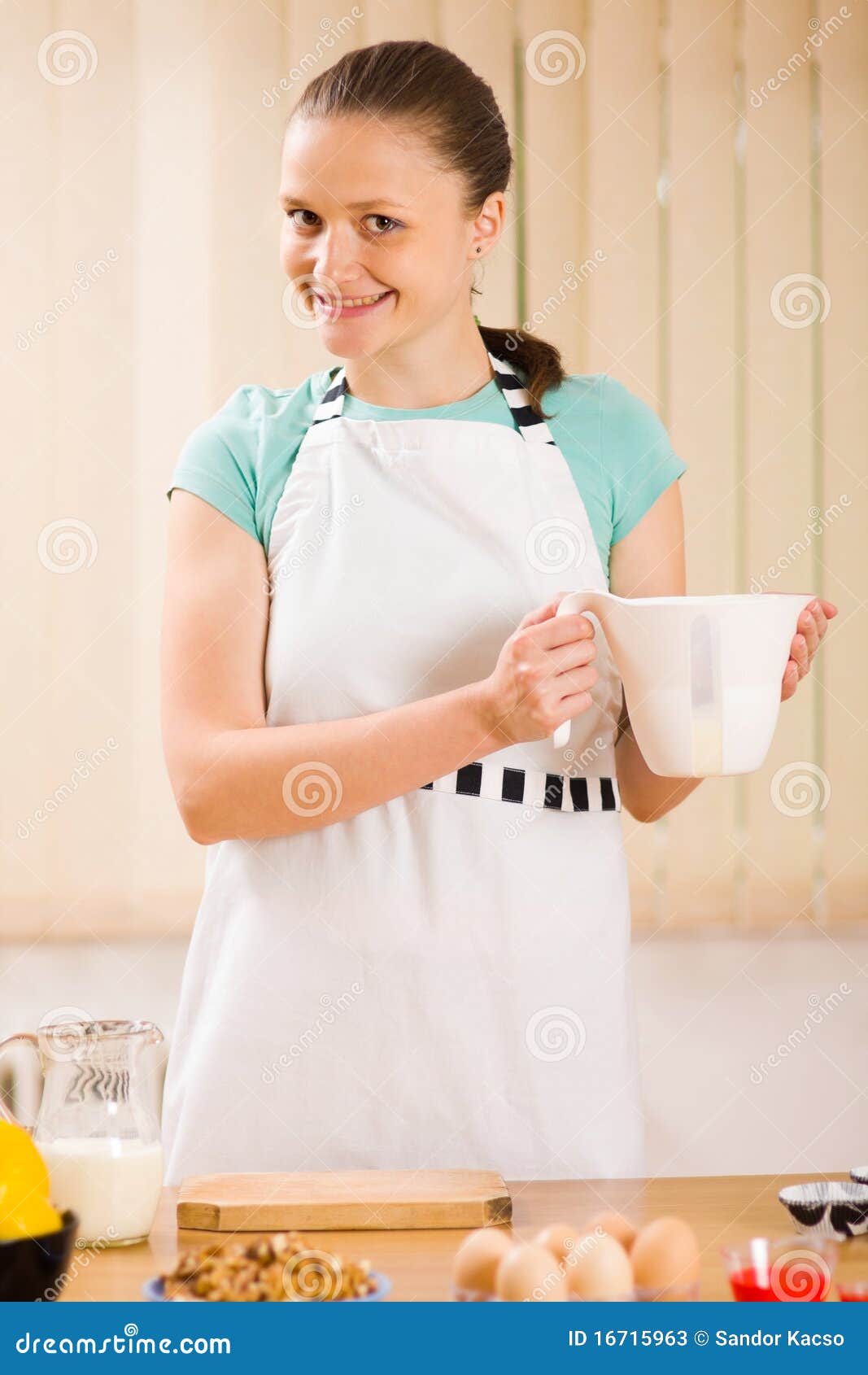 Smiling in the kitchen stock image. Image of housework - 16715963