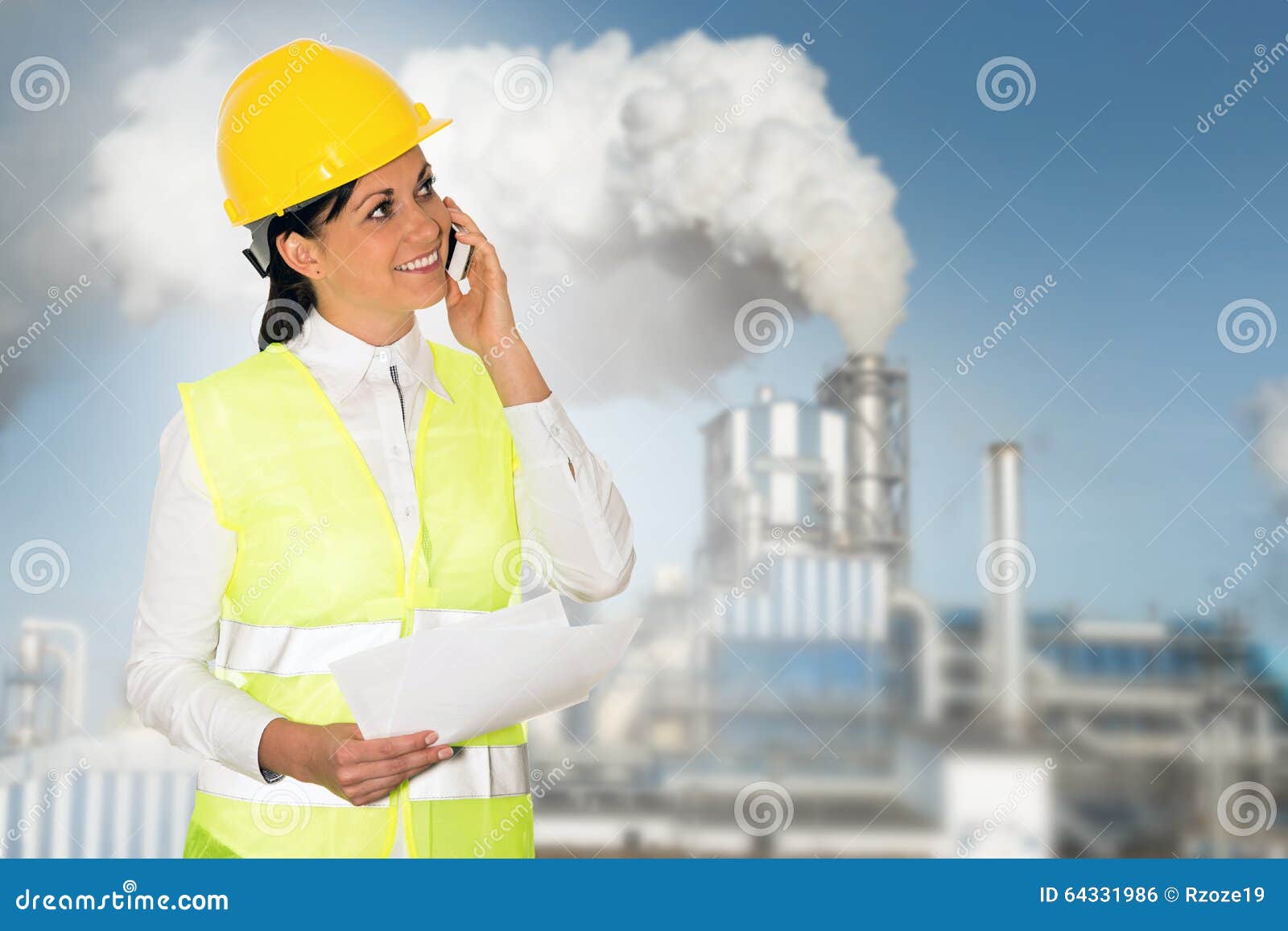 Smiling Lady Engineer Talking on the Phone and the Factory in Th Stock ...