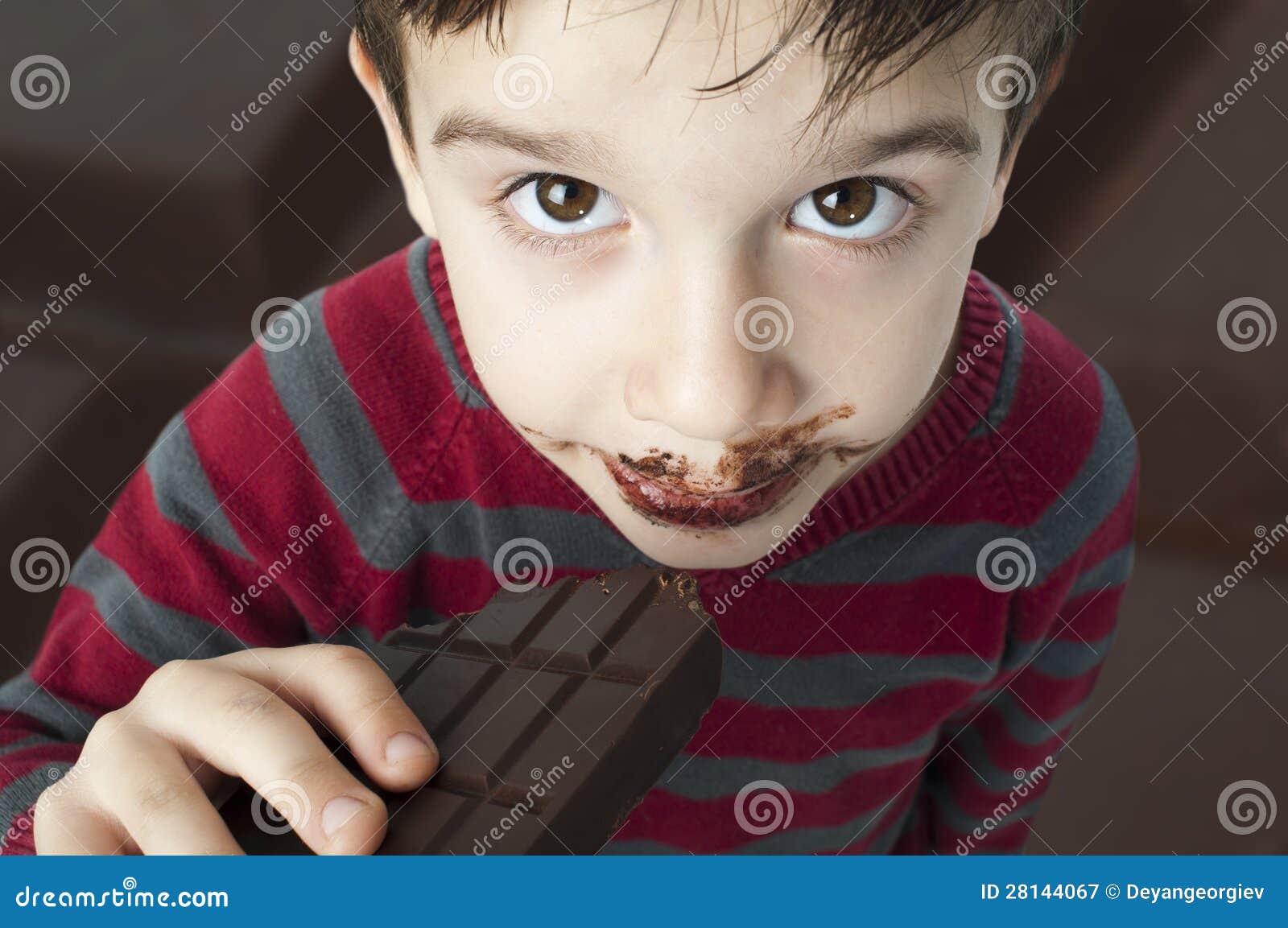 Smiling Little Boy Eating Chocolate Stock Image - Image of dessert ...