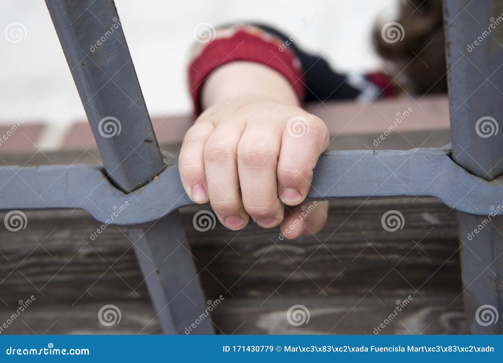 Smiling Little Boy Locked Behind Stock Image - Image of smiling, curls ...