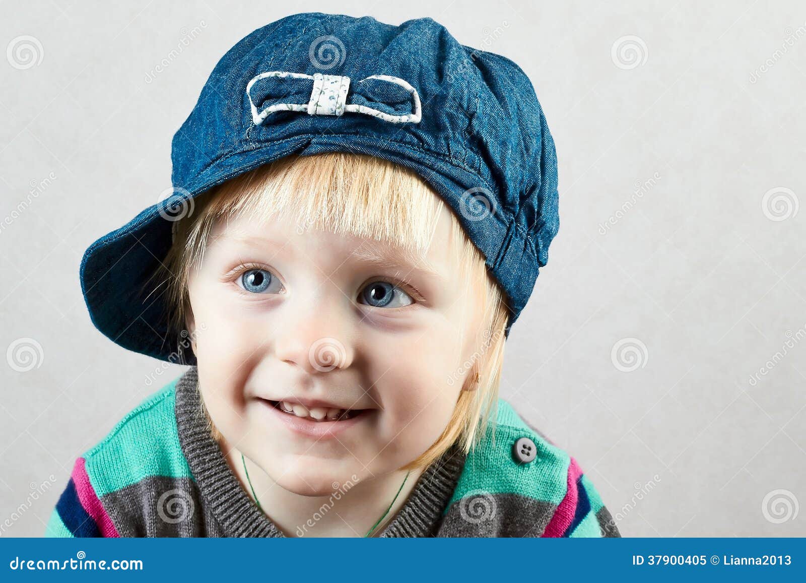 Smiling Little Girl with a Cap on Her Head Stock Image - Image of eyes ...