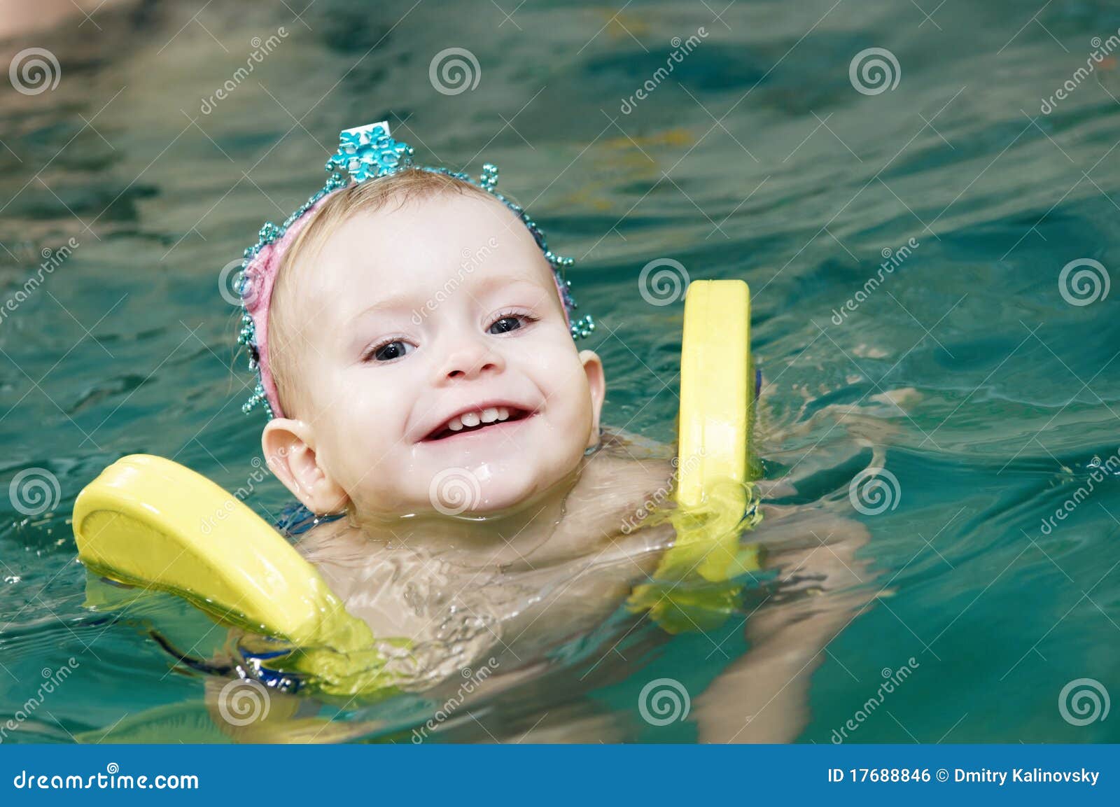 Smiling Little Girl Swimming at Stock Photo - Image of learning ...