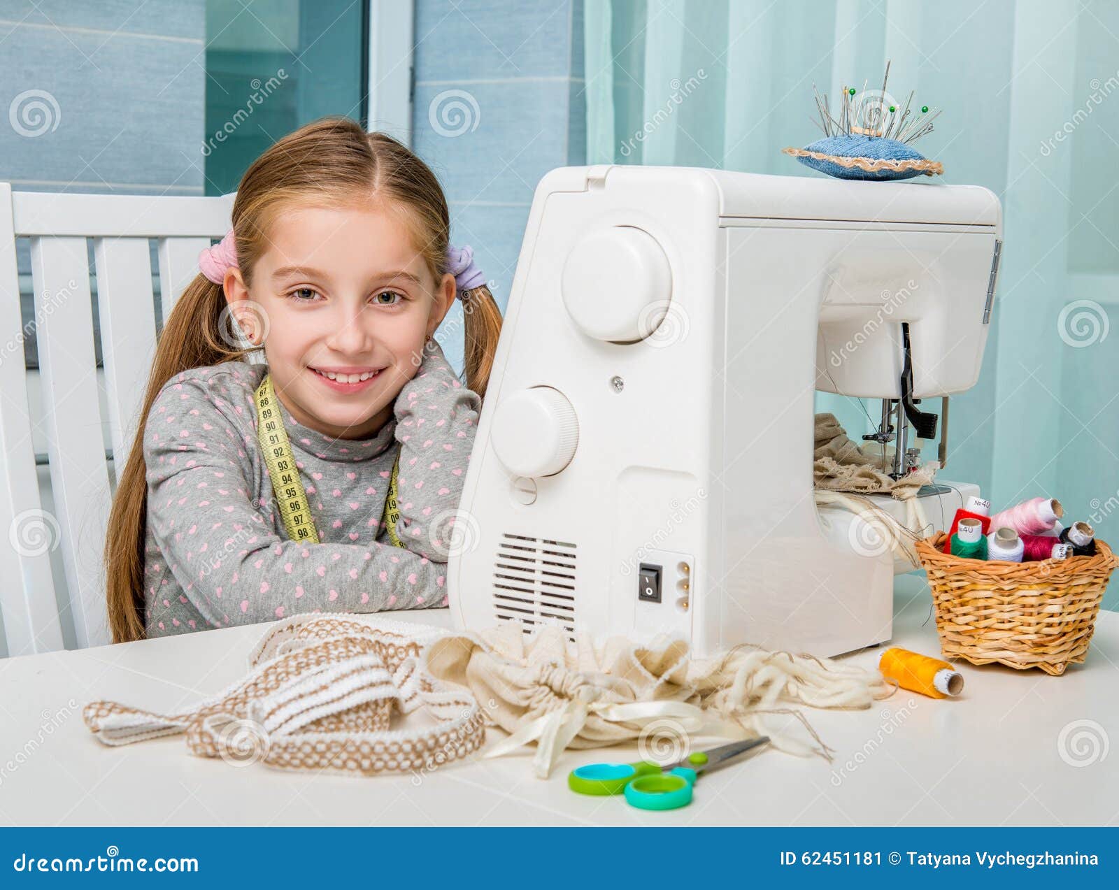 Smiling Little Girl at the Table with Sewing Stock Image - Image of ...